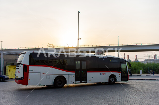 A bus at the bus station at Ibn Battuta Mall station in Dubai, public ...