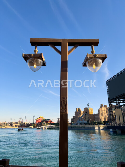 Road lighting poles around the largest artificial lake on Boulevard ...