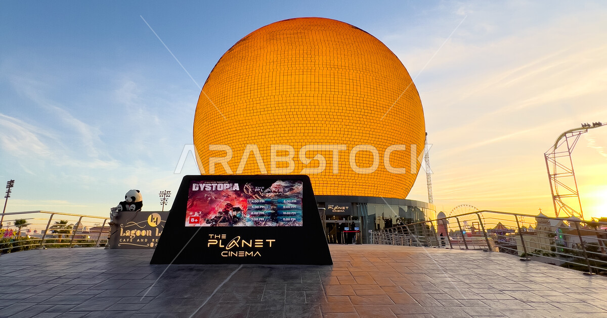 Giant illuminated ball shows in the middle of the water lake in ...