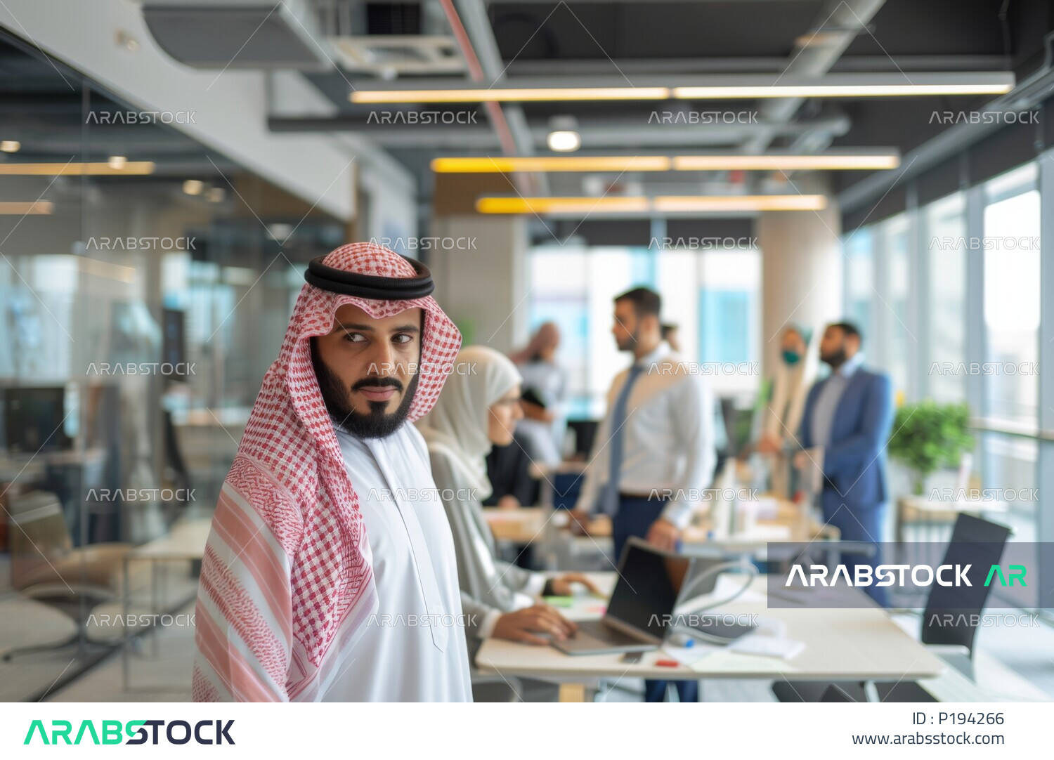 Meeting in office to discuss work progress, close up of Saudi Arabian ...
