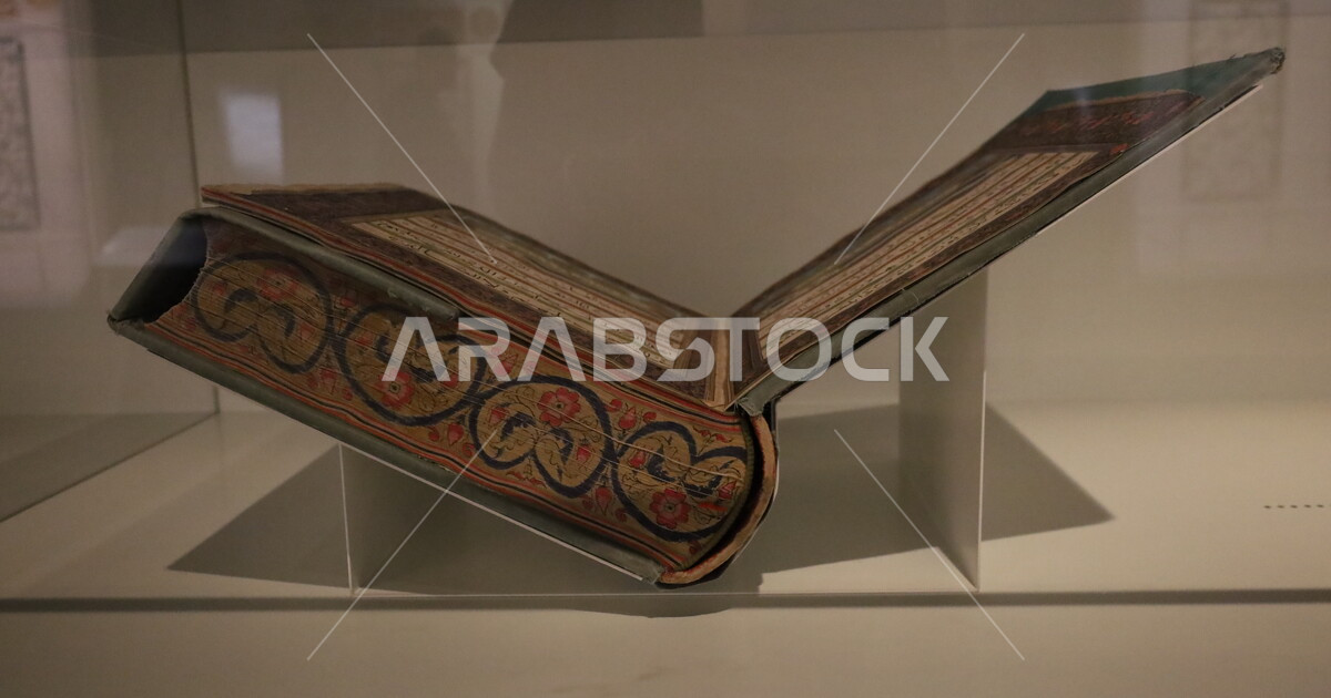A very old handwritten copy of the Holy Quran is on display at the ...