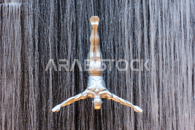 Tourism in the United Arab Emirates, a close-up of a diver statue ...