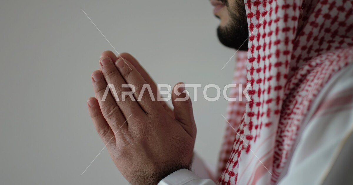 Supplication and prayer to the Lord of the Worlds, close-up of a Saudi ...