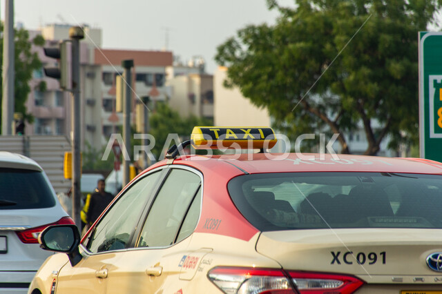 Taxi in Dubai, UAE, crowded roads and cars, using taxi to reach the ...