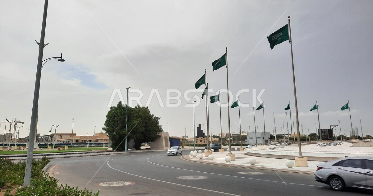 Tourist attractions during the day in Jeddah, green flags of the ...