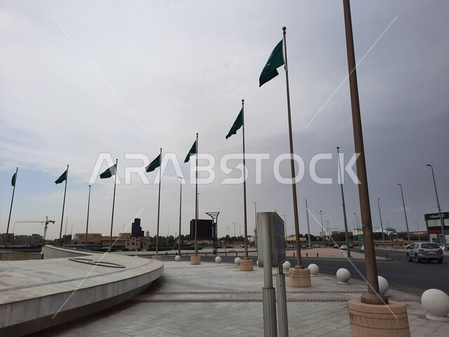 Green flags of the Kingdom of Saudi Arabia fluttering at the Corniche ...