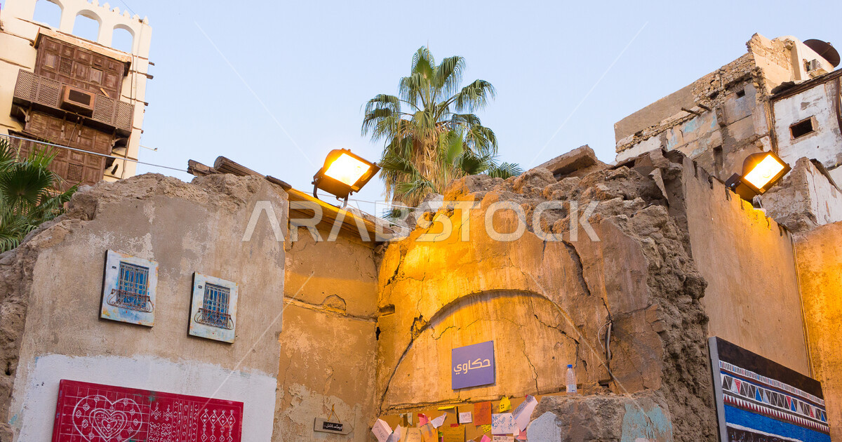 black metal street light under blue sky in saudi arabia, low angle view ...
