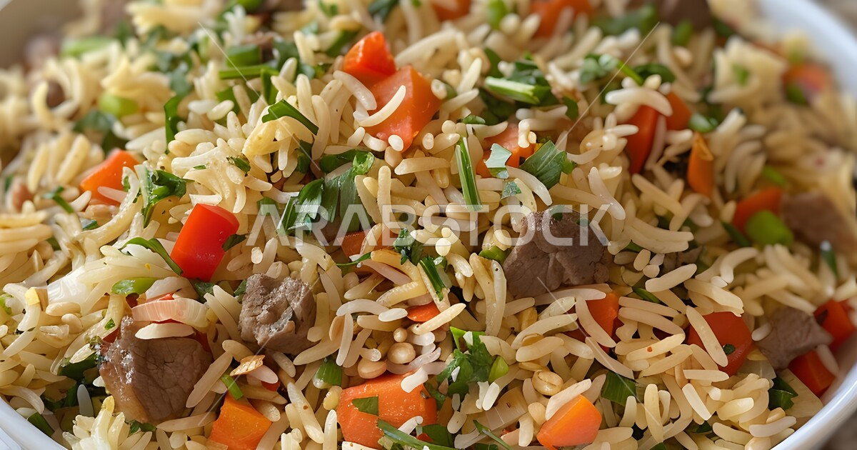 The skill of preparing the famous Gulf Mandi recipe with rich spices ...