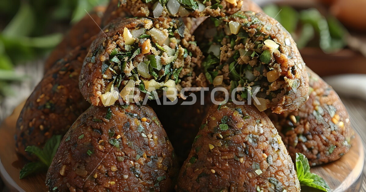 Middle Eastern stuffed meatballs on a wooden plate, a meal with high ...