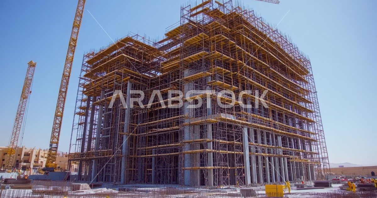 Building under construction using modern machinery in the Kingdom of ...