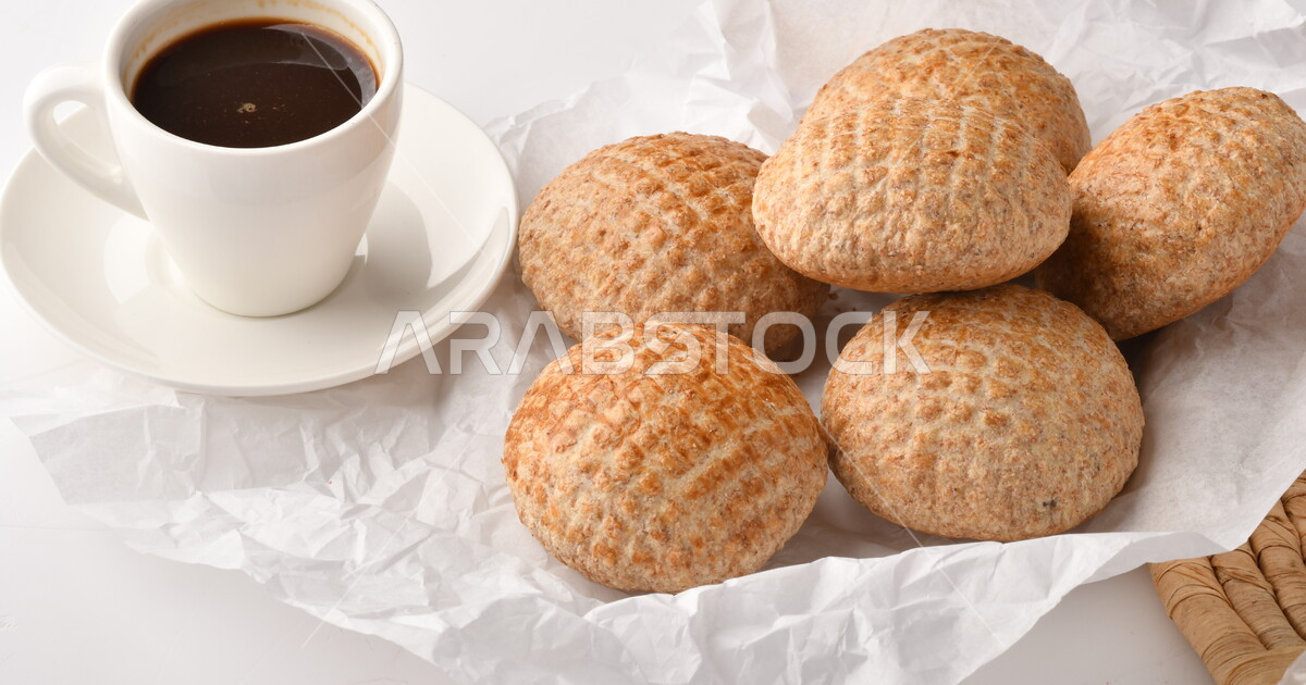 Maamoul is one of the popular delicious fragile sweets with a cup of ...