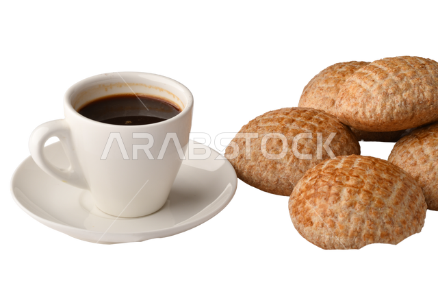 Maamoul is one of the popular delicious fragile sweets with a cup of ...