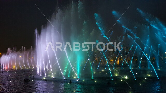 The dancing fountain in Riyadh City Boulevard lit up at night ...