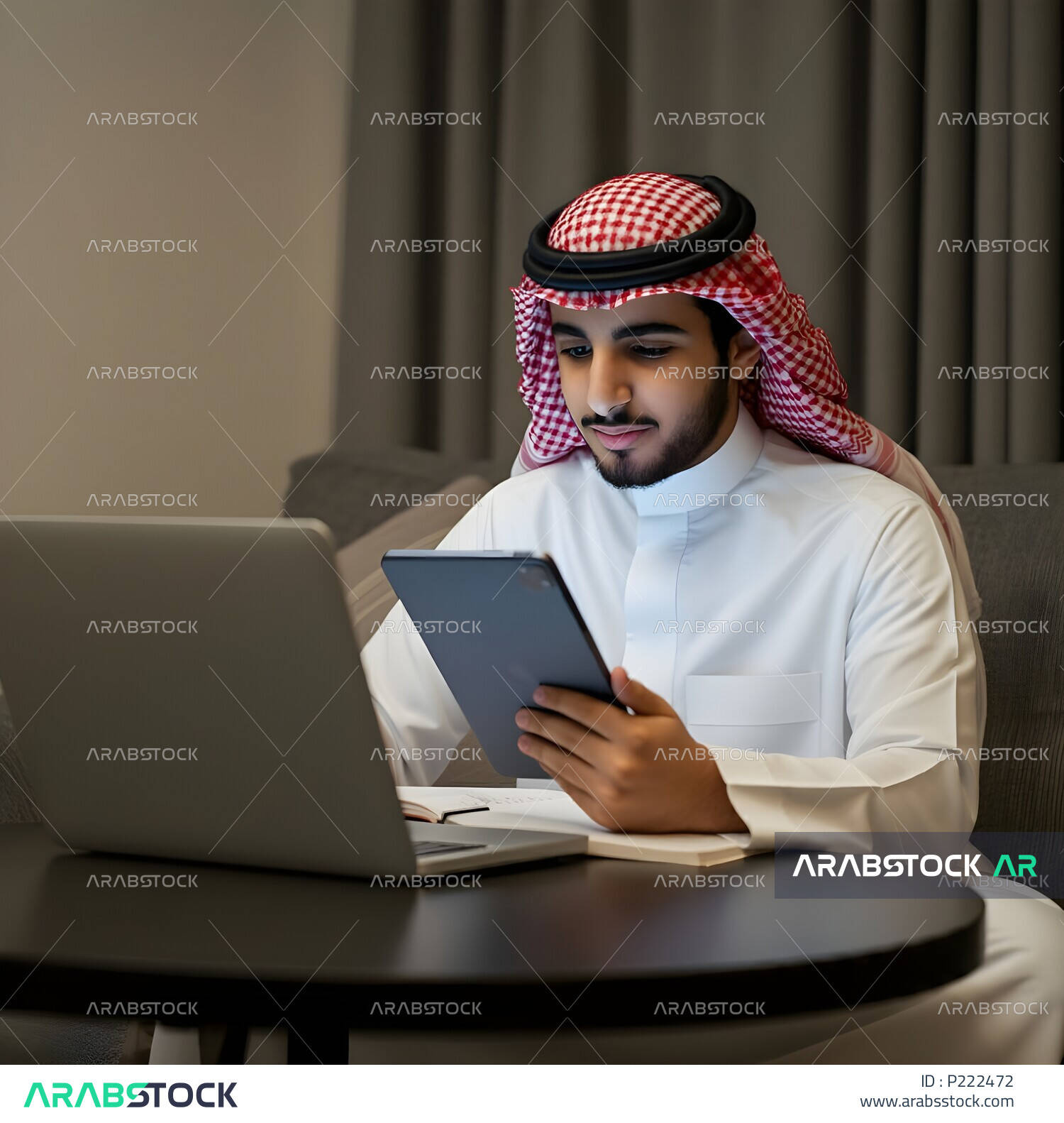 Finding an idea online, close-up of a young Saudi Arabian Gulf man ...