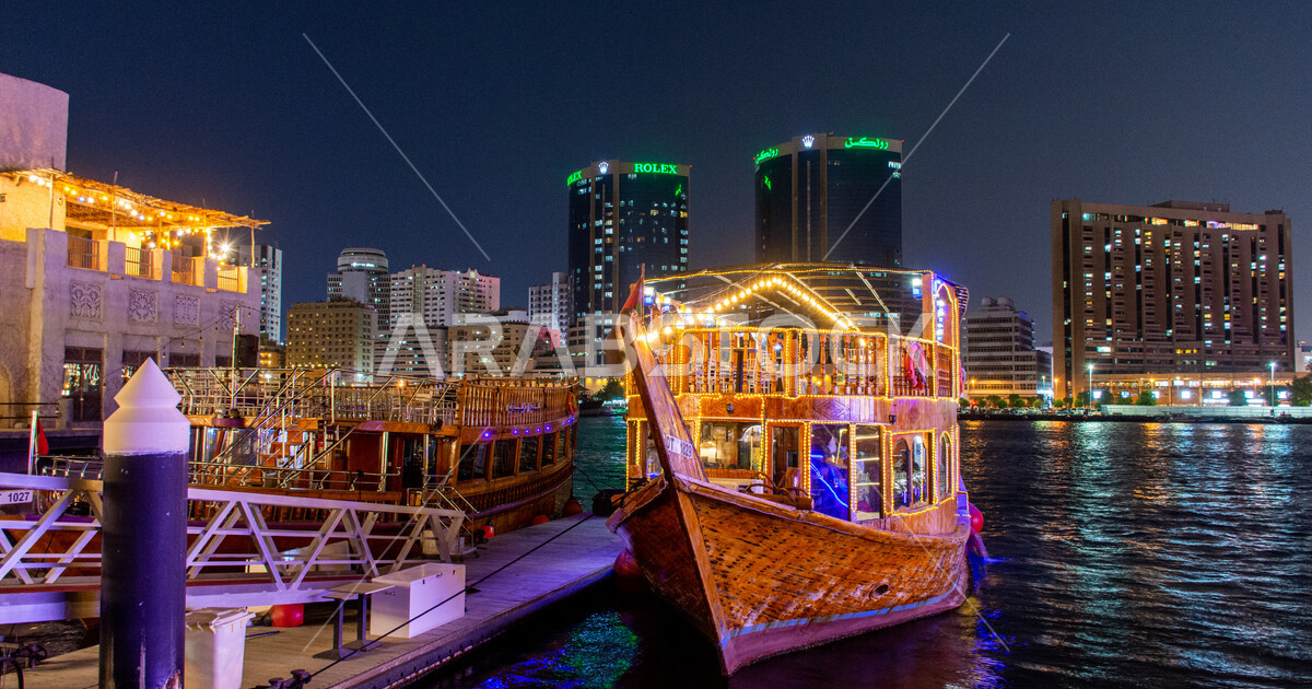 Reflection of lights on sea water, tourist attractions from around the ...