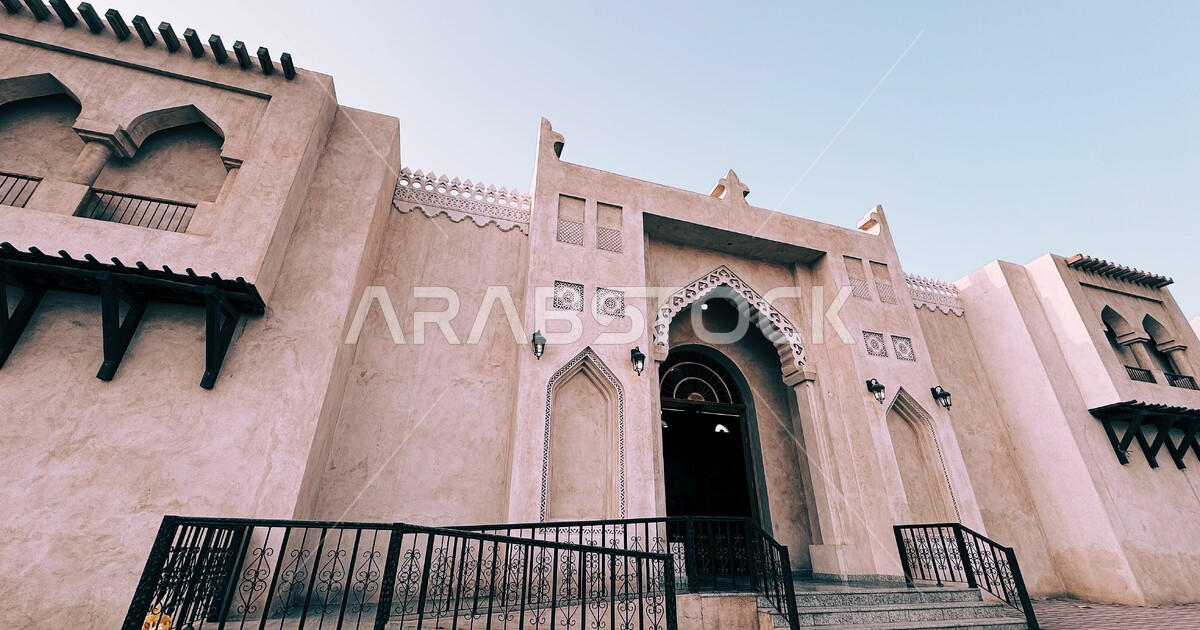 An old heritage giant door in the craftsmen market in Al-Ahsa region ...