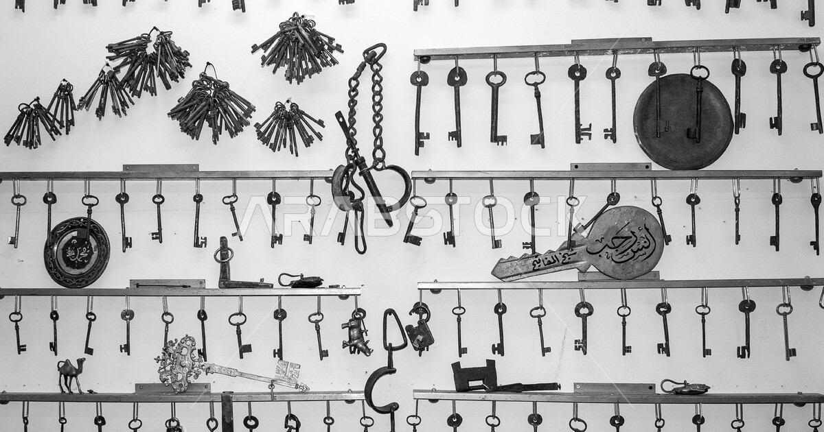 Picture of antique old keys hanging on the wall, key hanger, lock and ...