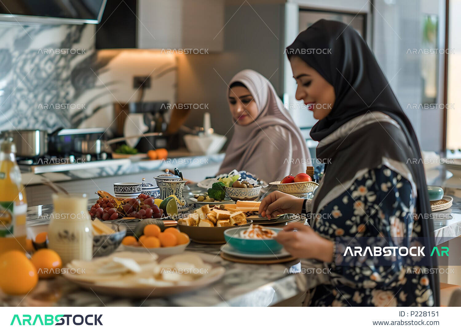 Preparing recipes and delicious foods, two Saudi Arabian Gulf women ...