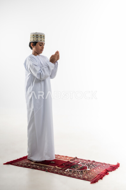 Repentance and return to God, portrait of an Arab Gulf Omani child ...