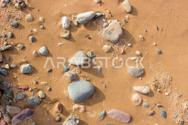 Nature in Saudi Arabia, sand dunes, picture of small rocks on the sands ...
