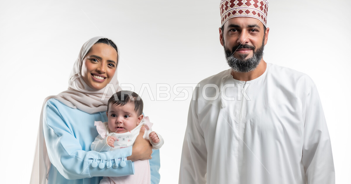 Care and attention to children, close portrait of an Arab Gulf Omani ...