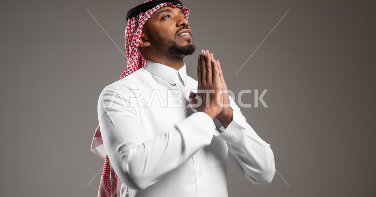 The supplication to God Almighty, standing with the gestures of ...