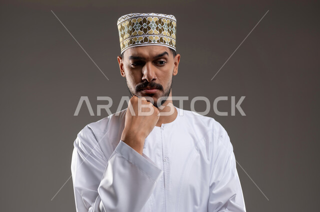 Thinking and planning something, facial gestures indicating ...