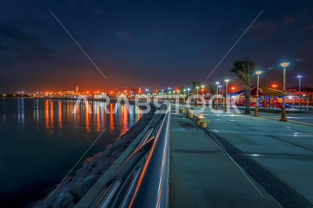 The waterfront of Al-Khobar Corniche illuminated at night, engineering ...