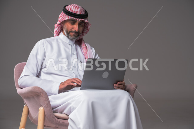 Browsing social media, holding an online business meeting, using laptop ...