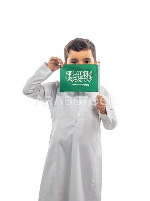 Portrait of a Saudi Arabian Gulf child with the flag of the Kingdom of ...