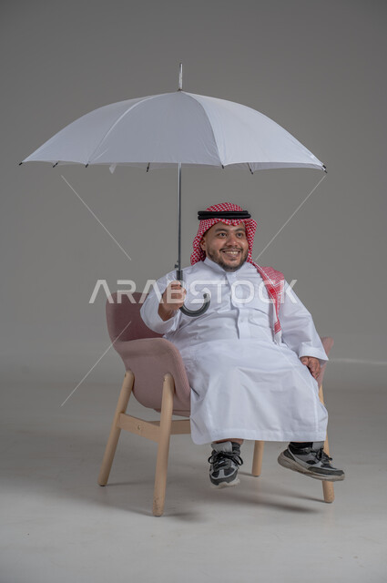 Concept of winter and rainy weather, shade from the sun, portrait of a ...