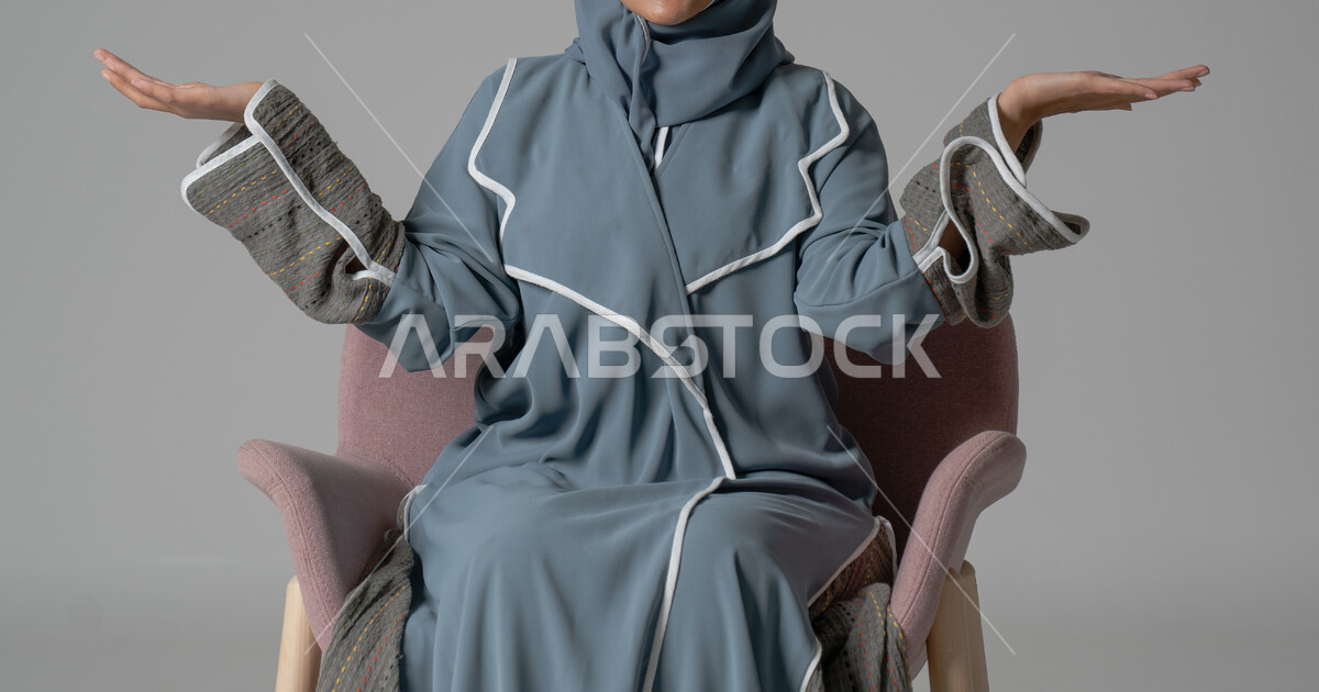 Concern for elegance and appearance, portrait of a veiled Saudi Arabian ...