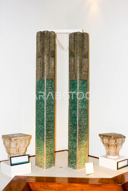 A picture of four founding texts on two stone pillars inside the Museum ...