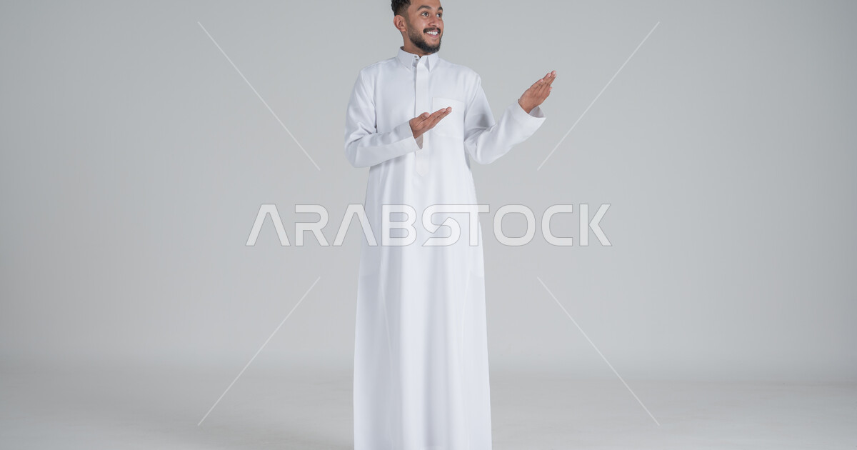 Standing upright and moderate, pointing to something, portrait of a ...