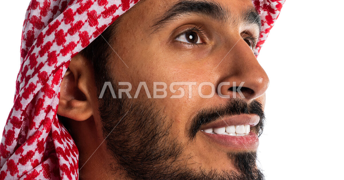 A close-up portrait of a Saudi Arabian Gulf man doing a photo session ...
