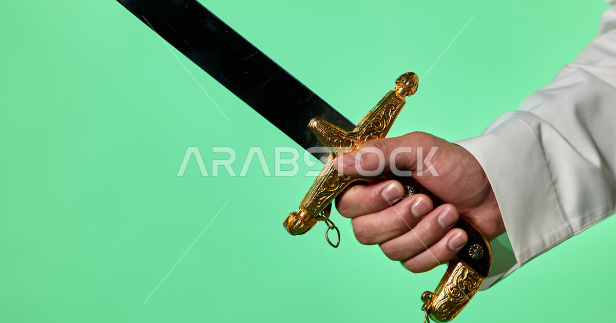 Traditional Saudi out-feet on chromakey. Arabian long saber - saif ...