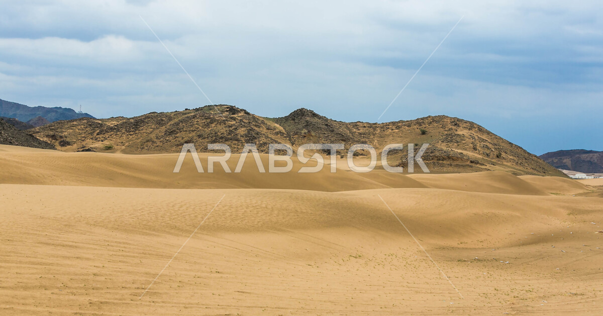 Close-up of the desert in Saudi Arabia, the rocky mountains and sand ...