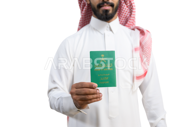 Portrait of a Saudi Arabian Gulf man holding a Saudi passport in his ...