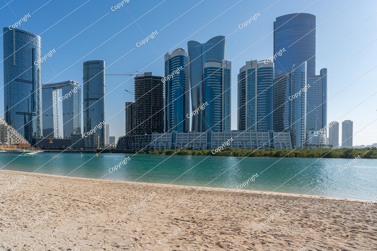 City surrounded by water | Al Reem island Sun and Sky towers in Abu ...
