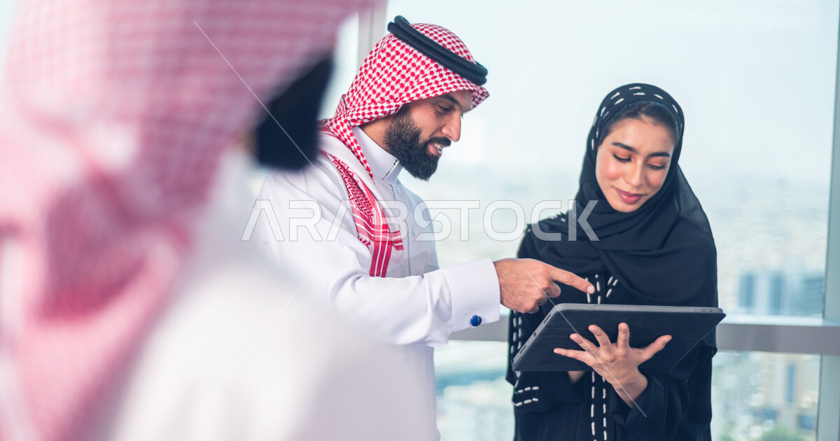 A group of Saudi businessmen inside the company's headquarters ...