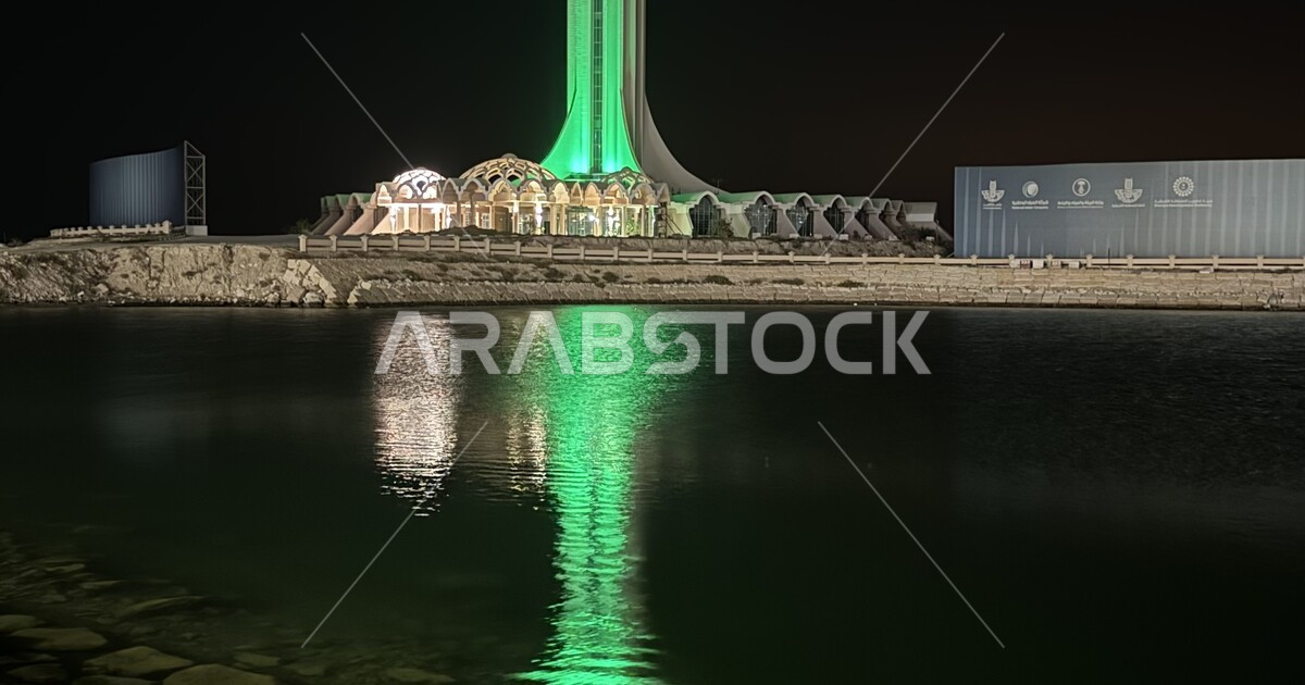 Green lit water tower on Khobar Corniche in Dammam, architectural art ...