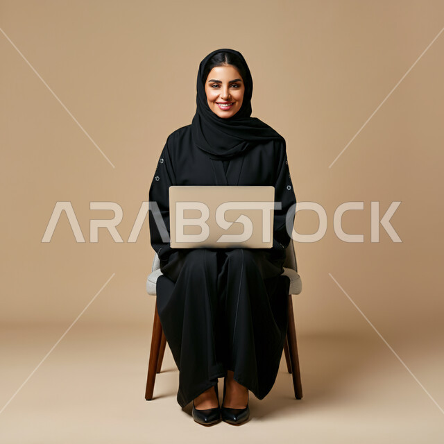 Doing work remotely via the internet, portrait of a Saudi Arabian Gulf ...