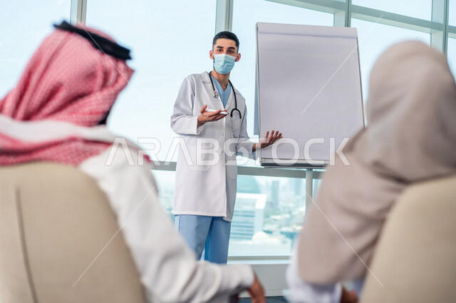 A Saudi Arabian Gulf medical team, exchanging medical consultations ...