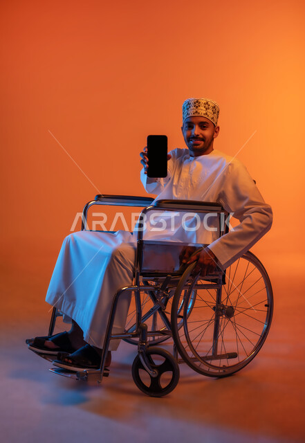 Looking at the camera with gestures of pleasure, using advanced modern ...