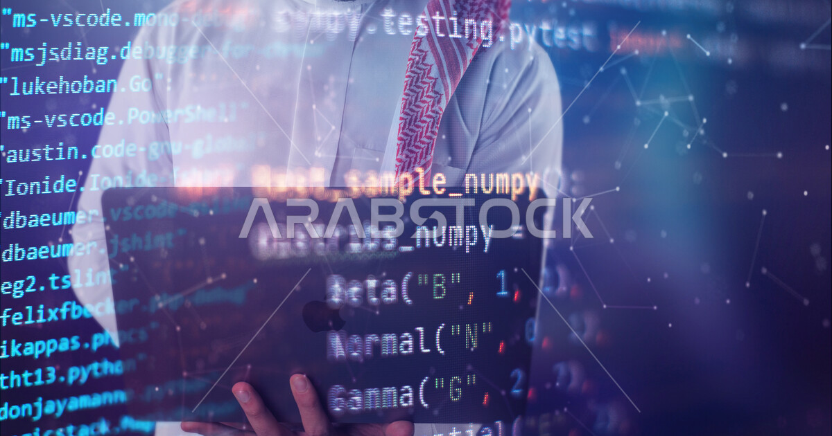 A young Saudi Gulf working as a web developer, using programming ...