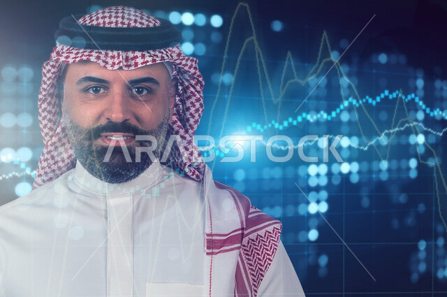 A close-up of a Saudi Arabian Gulf man standing in front of the stock ...