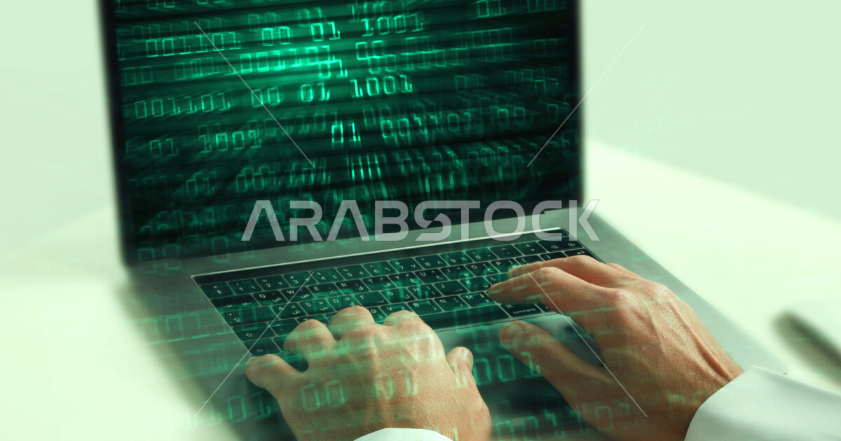 A young Saudi Gulf working as a web developer, using programming ...