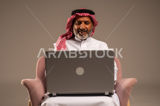 Browsing social media, using laptop to complete tasks, portrait of a ...