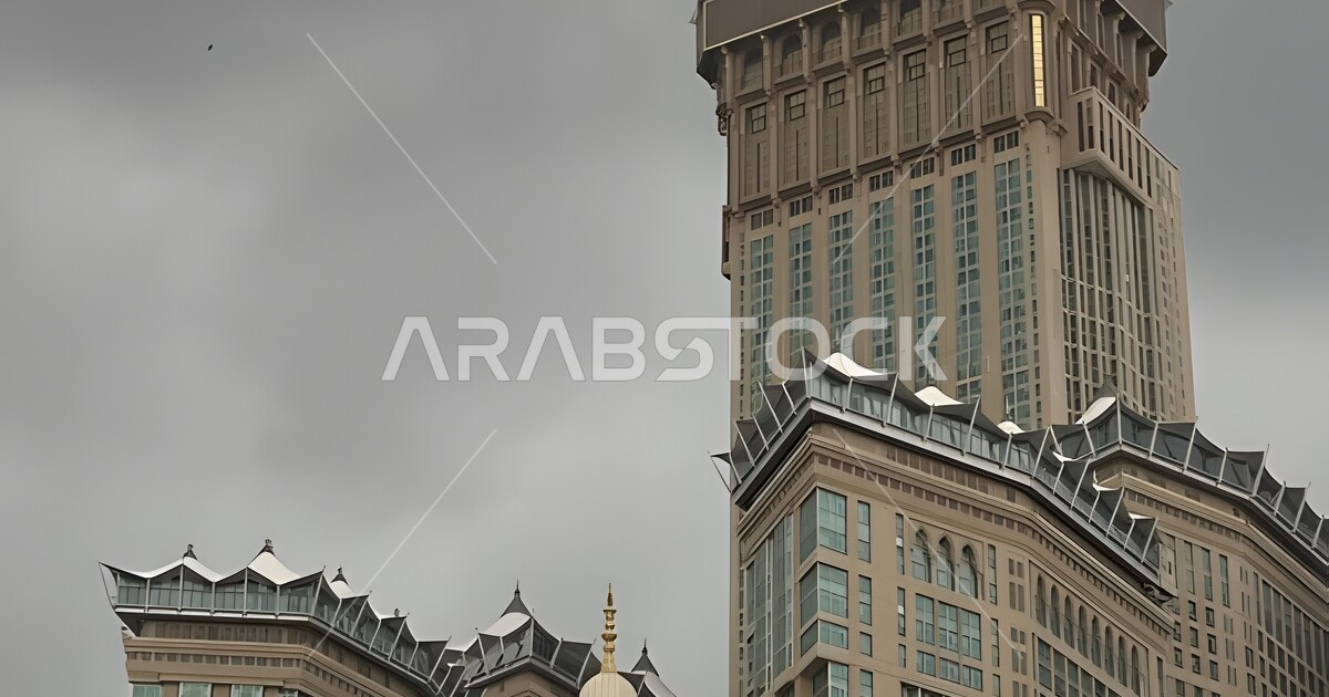 Towers overlooking the Grand Mosque, the Royal Clock Tower building in ...