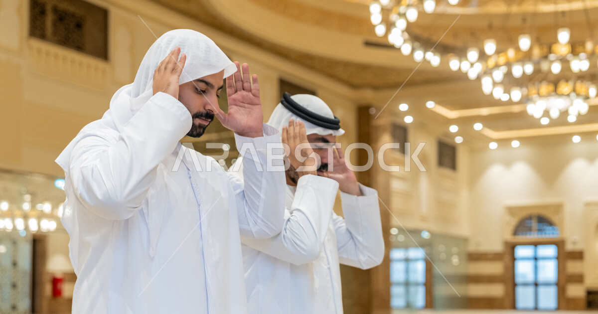 Takbir gestures to start prayer, performing the obligatory prayers on ...